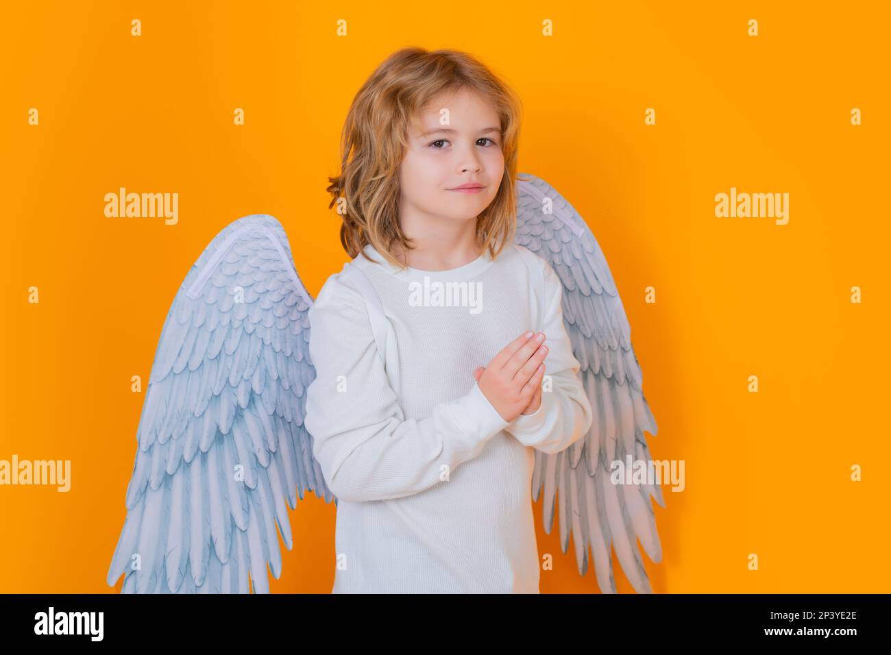 Angel prayer kids. Kid wearing angel costume white dress and feather ...