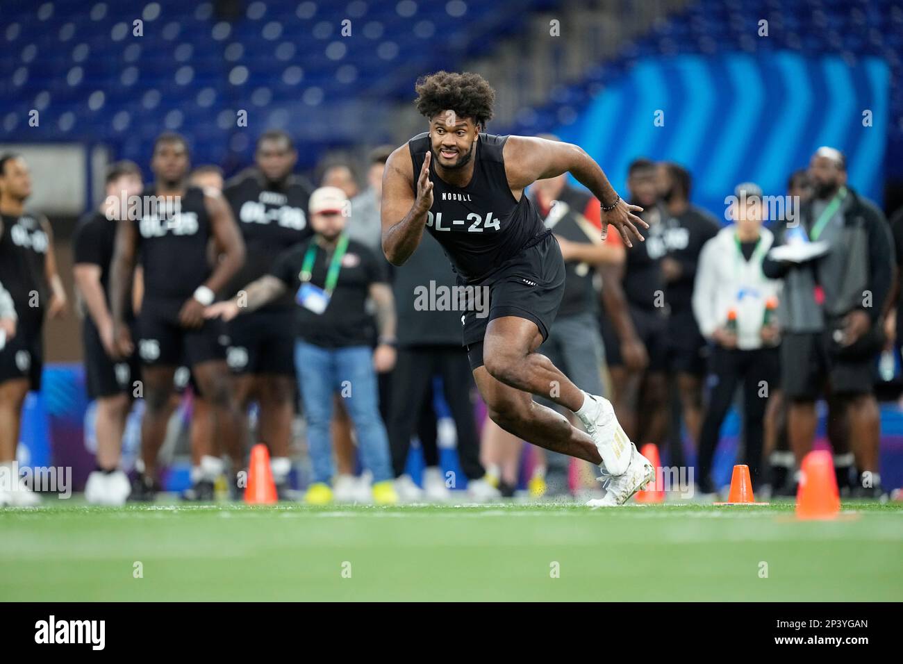 Ohio State offensive lineman Paris Johnson Jr. runs a drill at the NFL ...