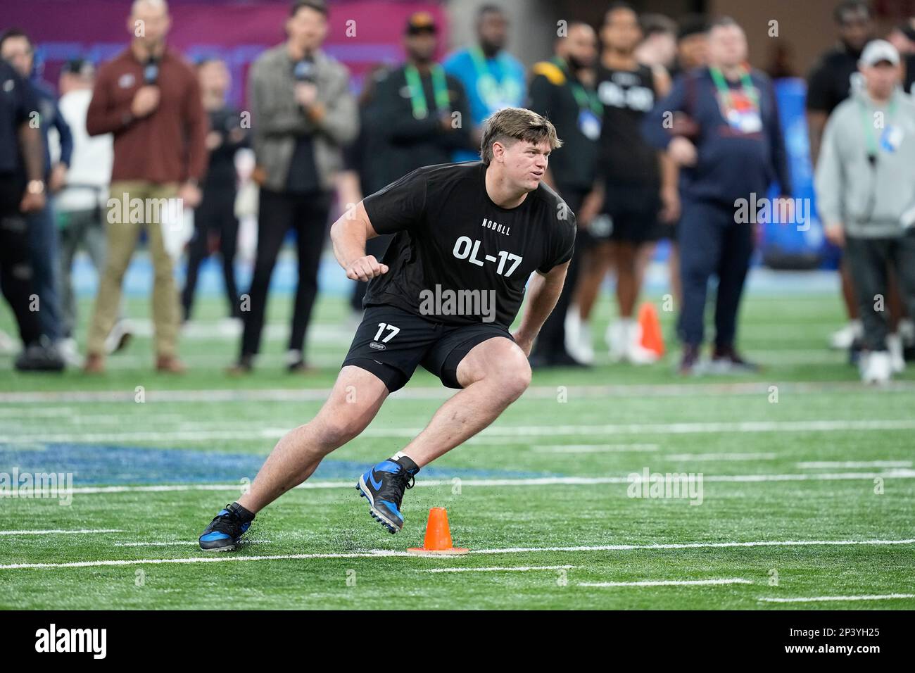 BYU offensive lineman Blake Freeland runs a drill at the NFL football ...