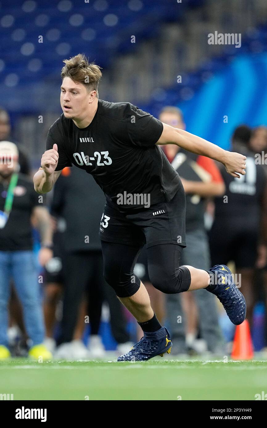 Michigan offensive lineman Ryan Hayes runs a drill at the NFL football ...