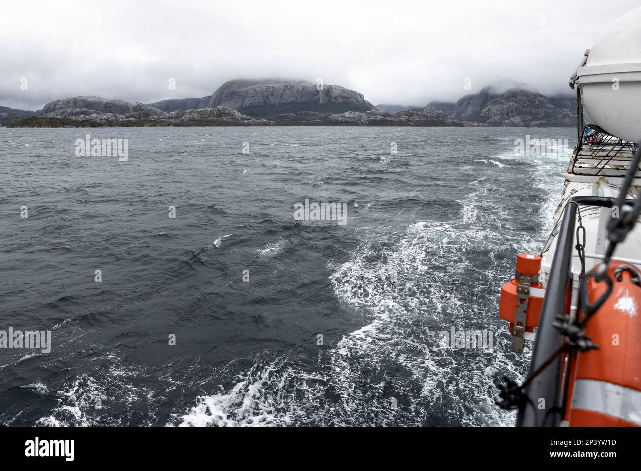 Ferry in the cold water of the fjords of southern Chile Stock Photo - Alamy