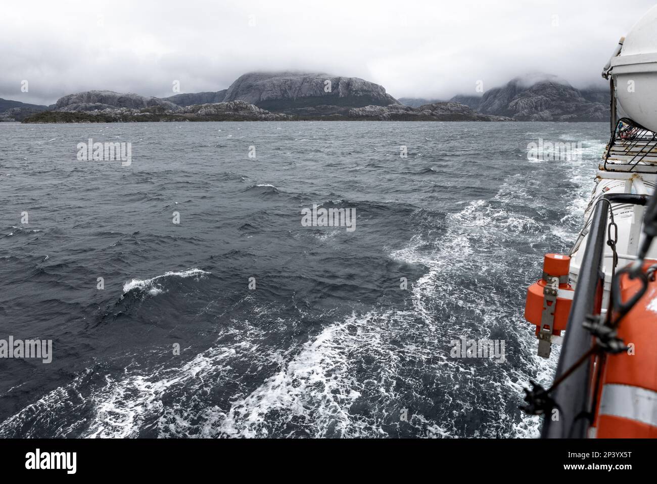 Ferry in the cold water of the fjords of southern Chile Stock Photo - Alamy