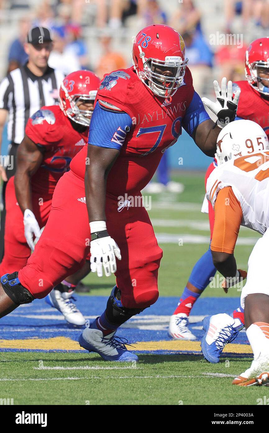 September 27 2014: Kansas offensive right tackle Larry Mazyck blocks ...