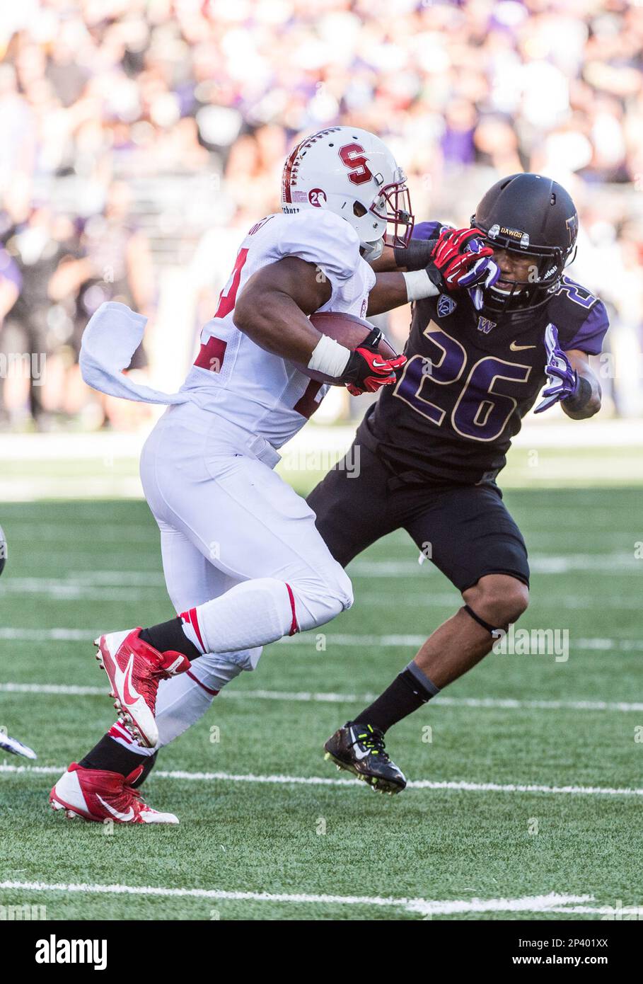 SEP 27 2014: Husky lineback Sidney Jones is stiff armed by Stanford ...