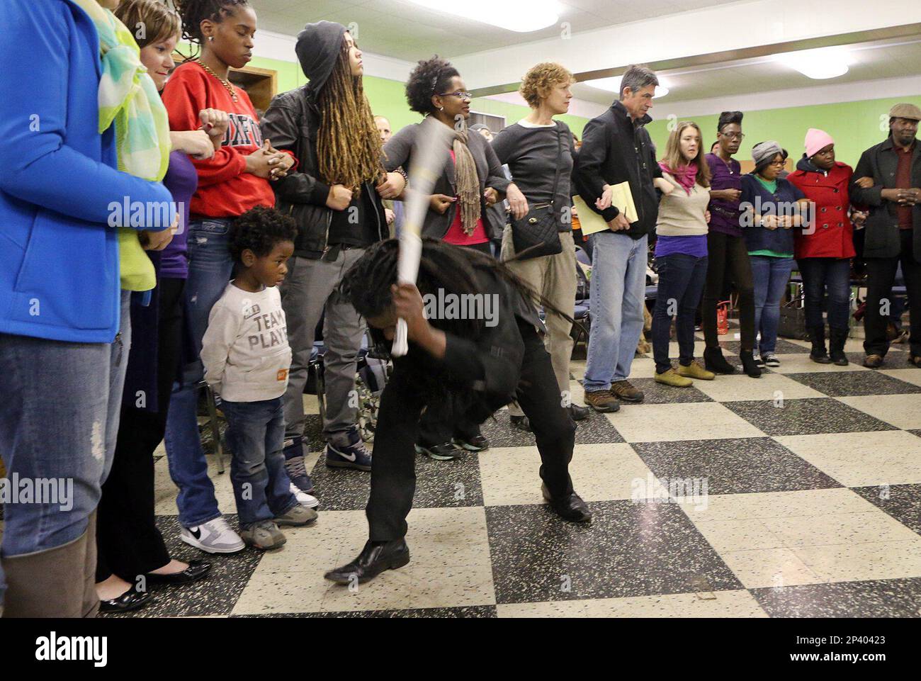 In this Wednesday, Nov. 12, 2014 photo, Rev. Osagyefo Sekou, a pastor ...
