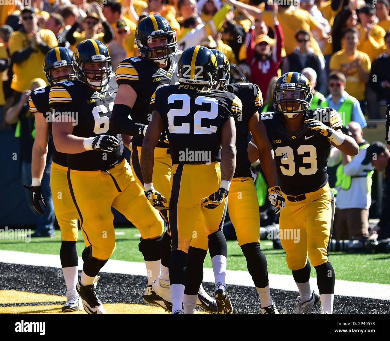 October 11, 2014: Iowa players celebrate with Iowa Hawkeyes' wide ...