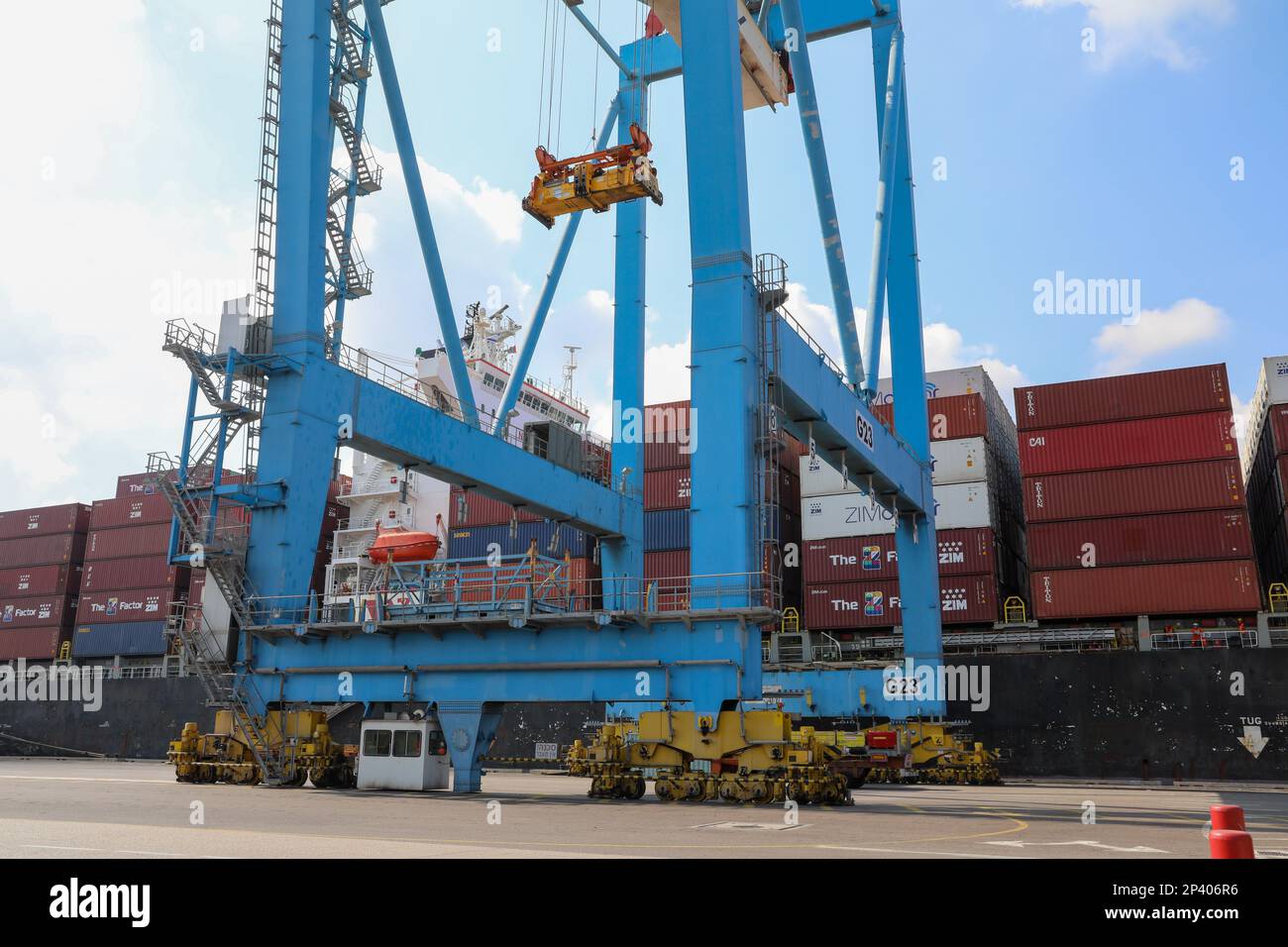 Shipping port of Haifa, Israel - October 25, 2021: Crane and vehicle ...