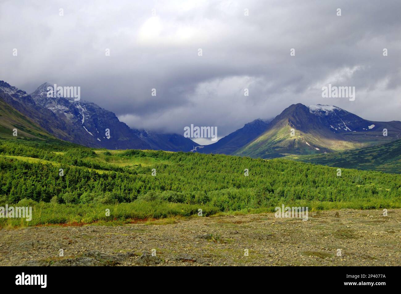 Snow topped mountains and landscape scene Stock Photo - Alamy