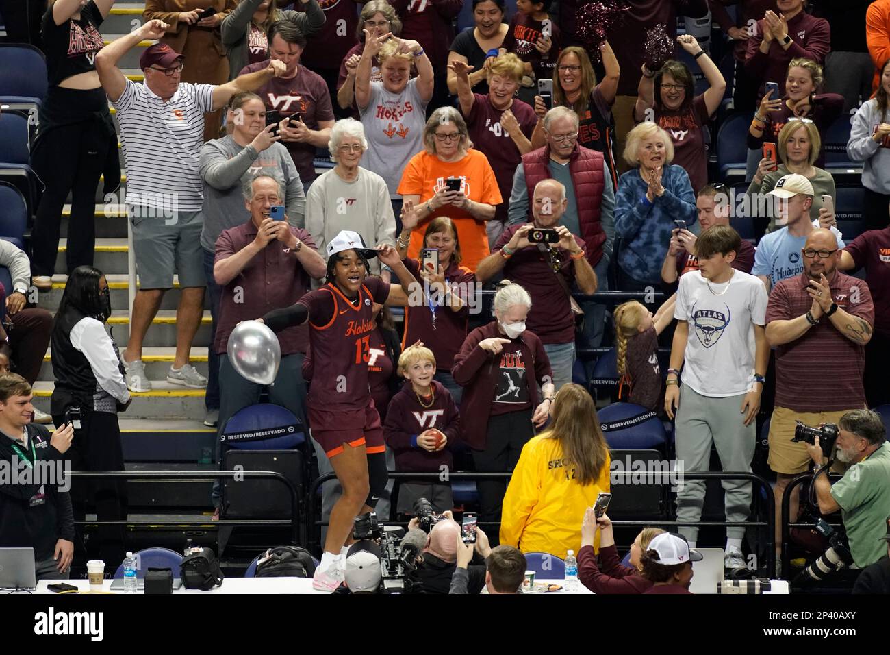 Virginia Tech forward Taylor Soule (13) celebrates with fans after ...