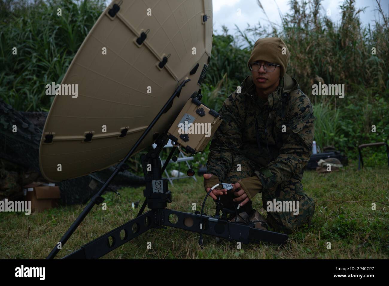 U.S. Marine Corps Lance Cpl. Jesse Jimenez, a satellite communications ...