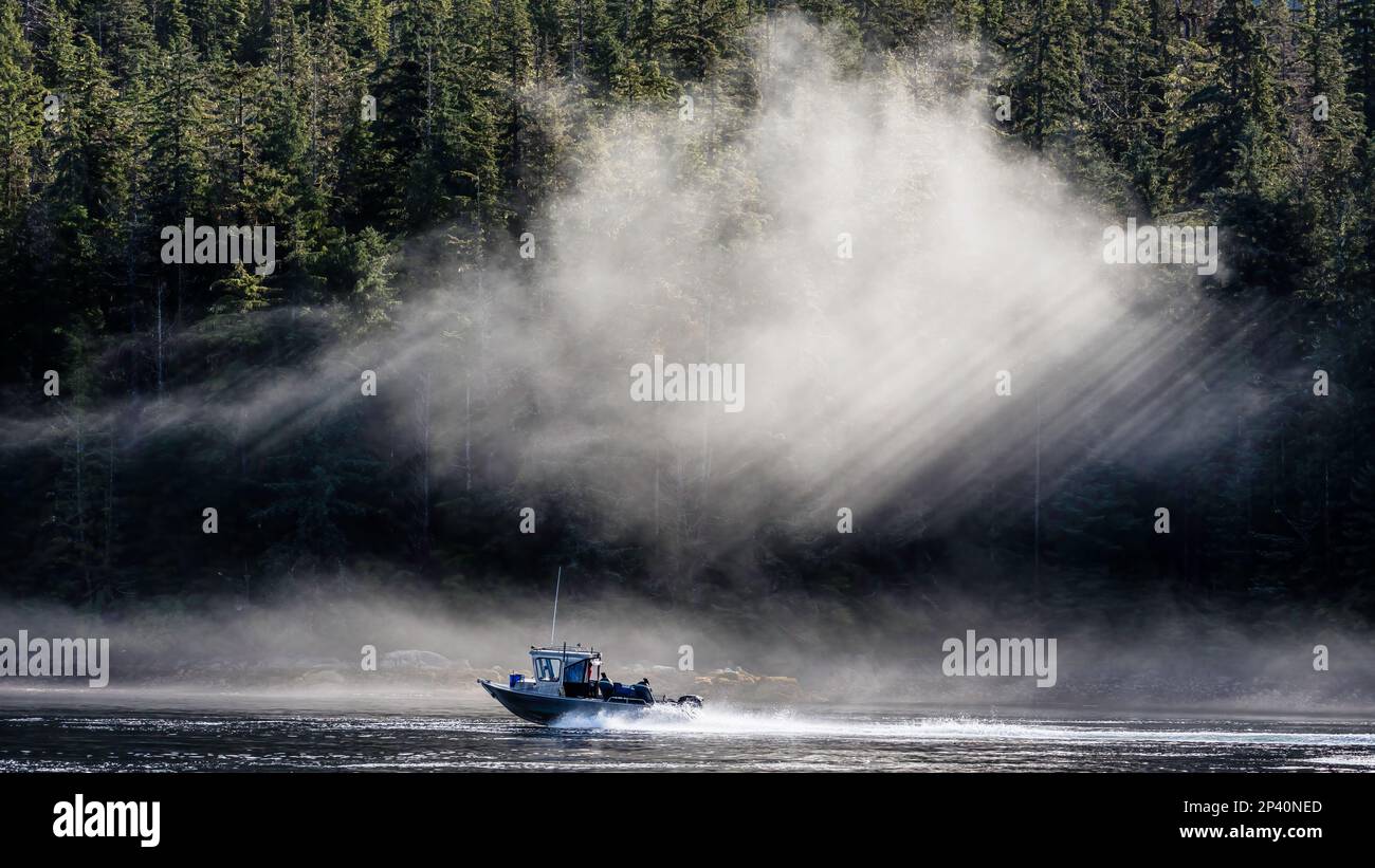 Power boat and fog at De Goff Island, Southeast Alaska, USA Stock Photo ...