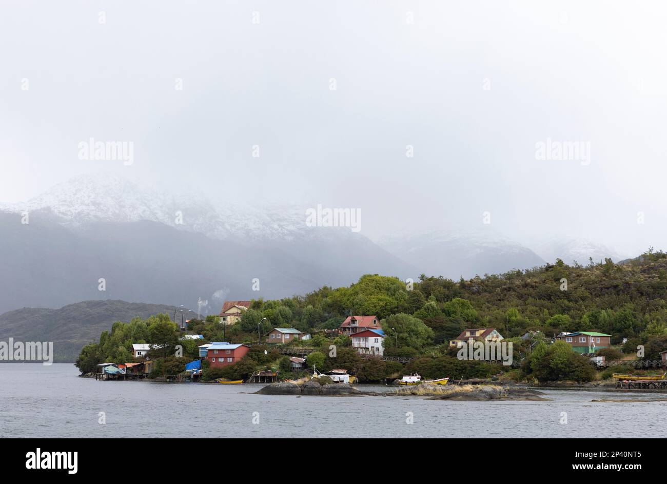 Puerto Edén viewed from a ferry cruising through the fjords of southern ...