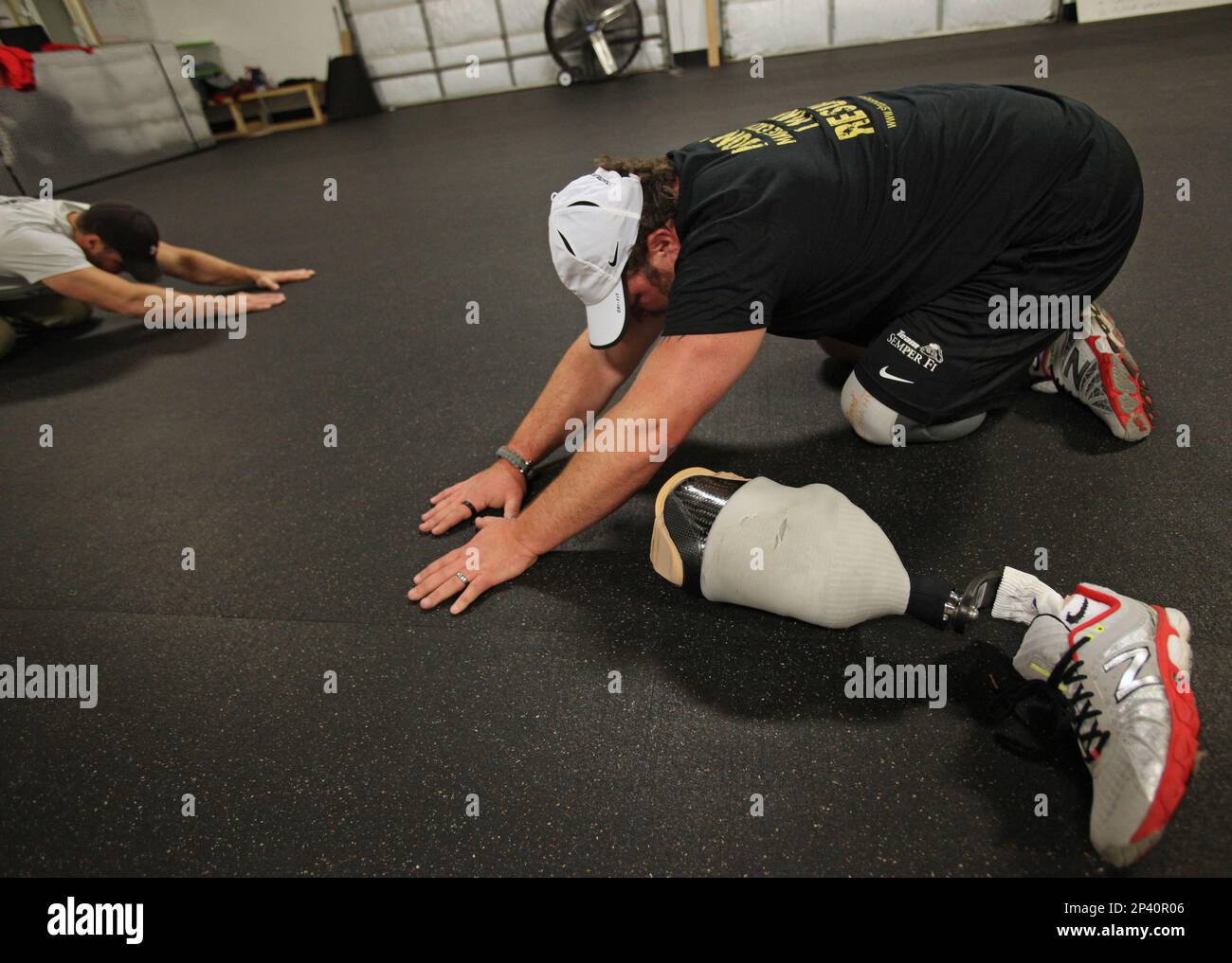 In this Saturday, Nov. 8, 2014 photo, veteran B.J. Ganem stretches ...