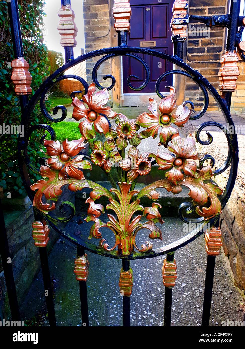 This gate is a triumph of the Blacksmith's art with its flowers so ...