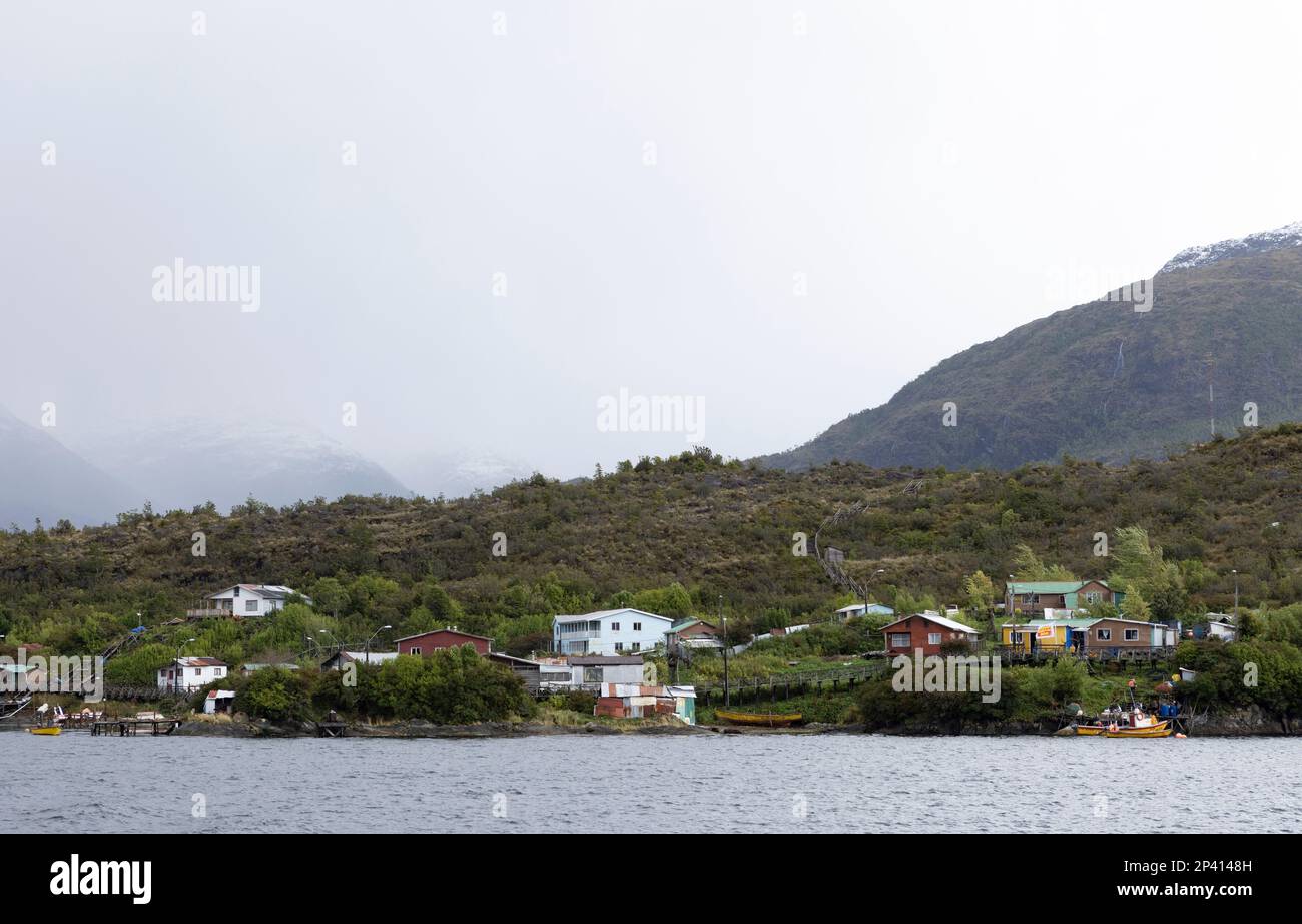 Puerto Edén viewed from a ferry cruising through the fjords of southern ...