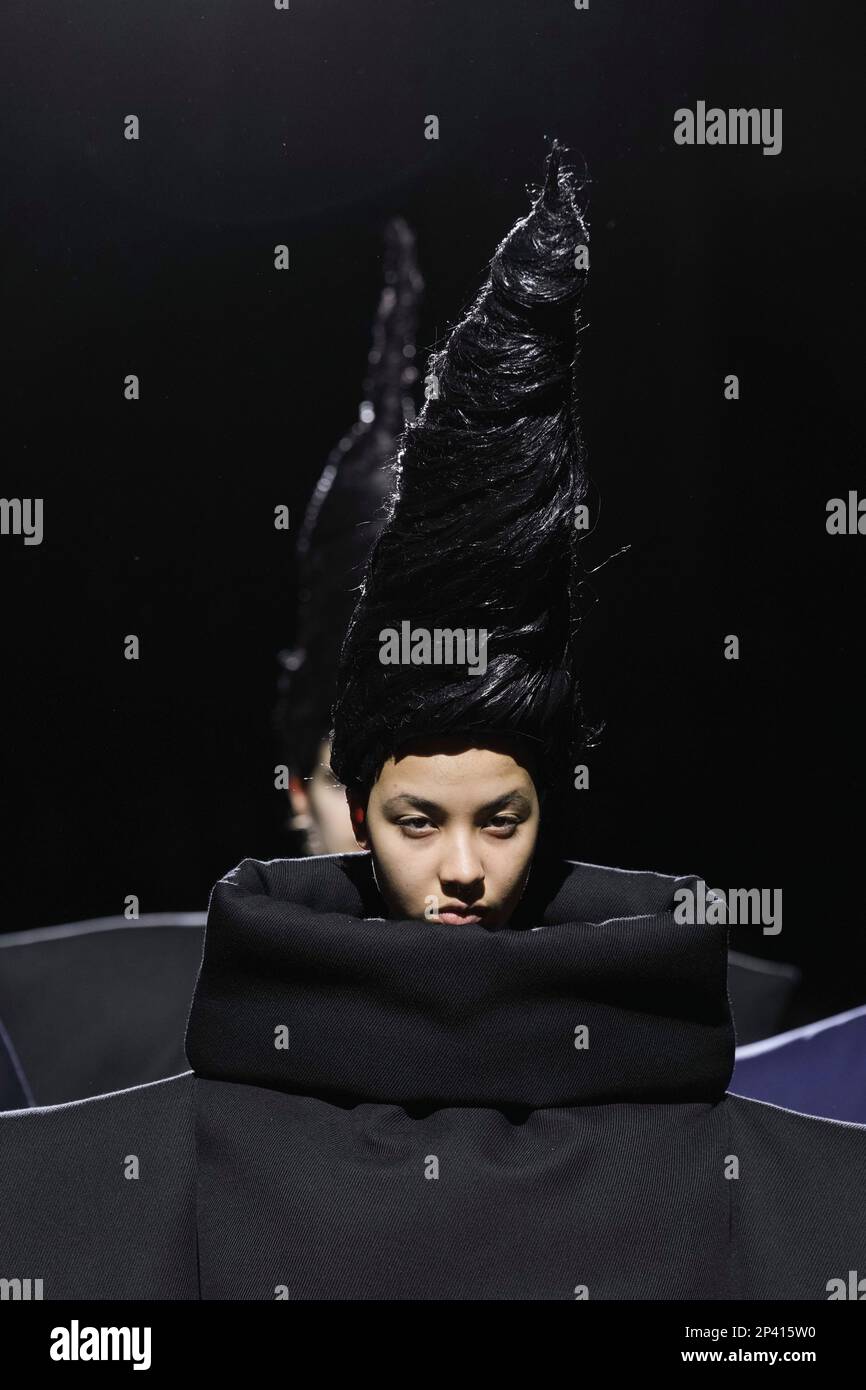 Models wear creations as part of the Comme des Garcons Fall/Winter 2023 ...