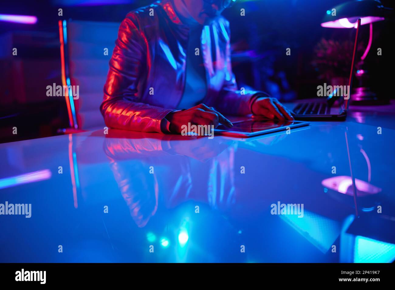 Neon metaverse futuristic concept. Closeup on female with tablet PC ...