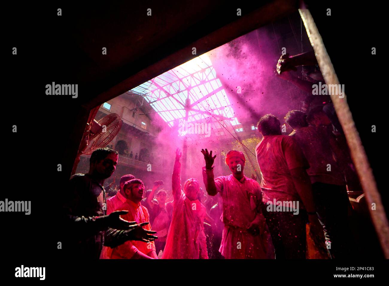 Vrindavan, India. 05th Mar, 2023. Hindu devotees are seen throwing ...
