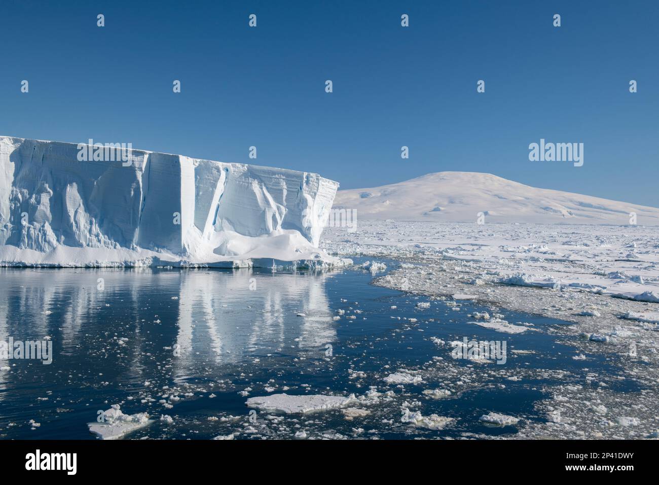 Antarctica, Amundsen Sea, Siple Island. Large iceberg with Mount Siple ...