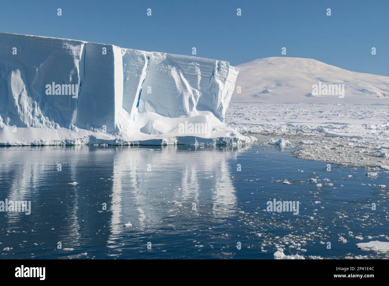 Antarctica, Amundsen Sea, Siple Island. Large iceberg with Mount Siple ...