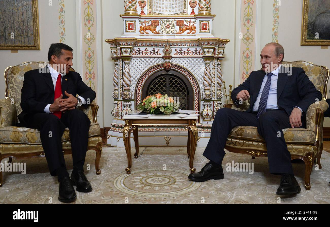 Russian President Vladimir Putin, right, and Peruvian President Ollanta ...