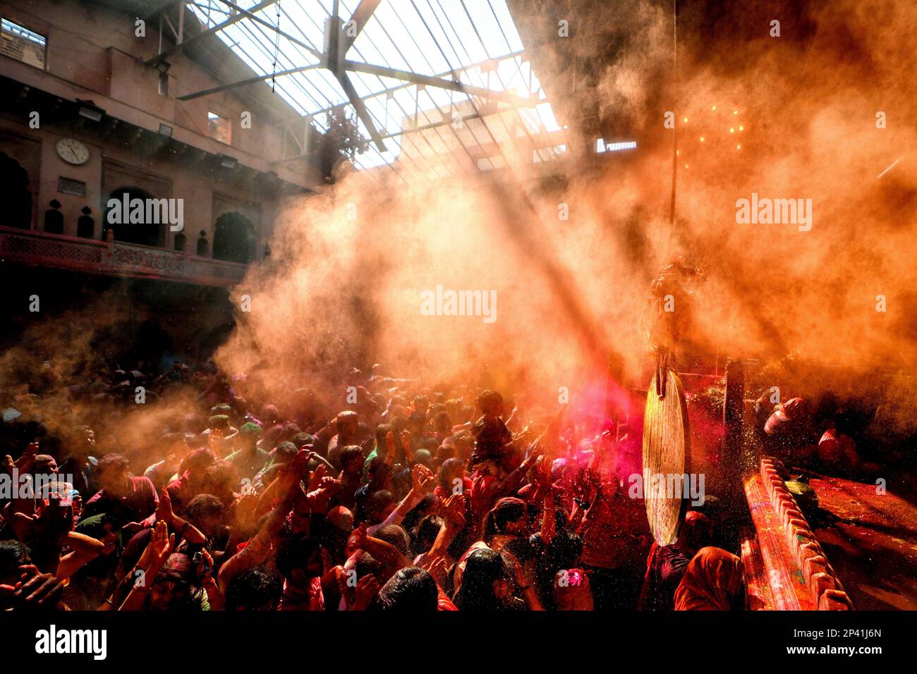 Vrindavan, India. 05th Mar, 2023. Hindu devotees are seen throwing ...