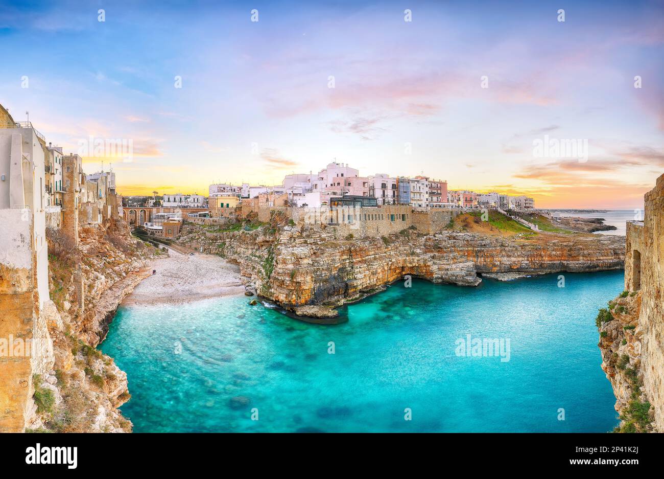 Stunning sunset at Cala Paura gulf with Bastione di Santo Stefano and ...