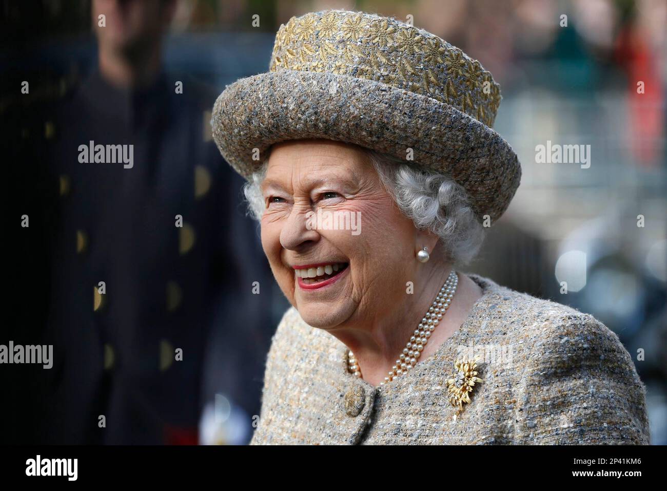 Britain's Queen Elizabeth smiles as she arrives for the opening of the ...