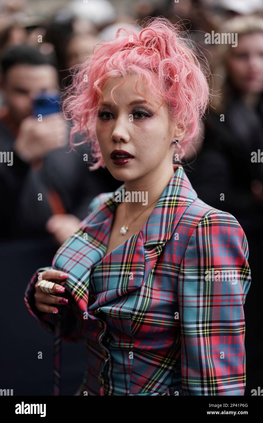Riisa Naka poses for photographers upon arrival at the Vivienne ...