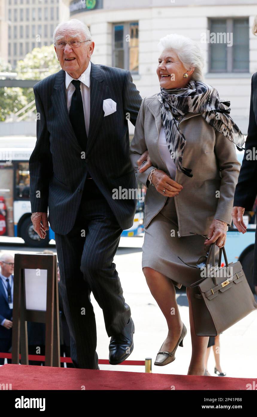 Former Australian Prime Minister Malcolm Fraser, left, arrives at Town ...