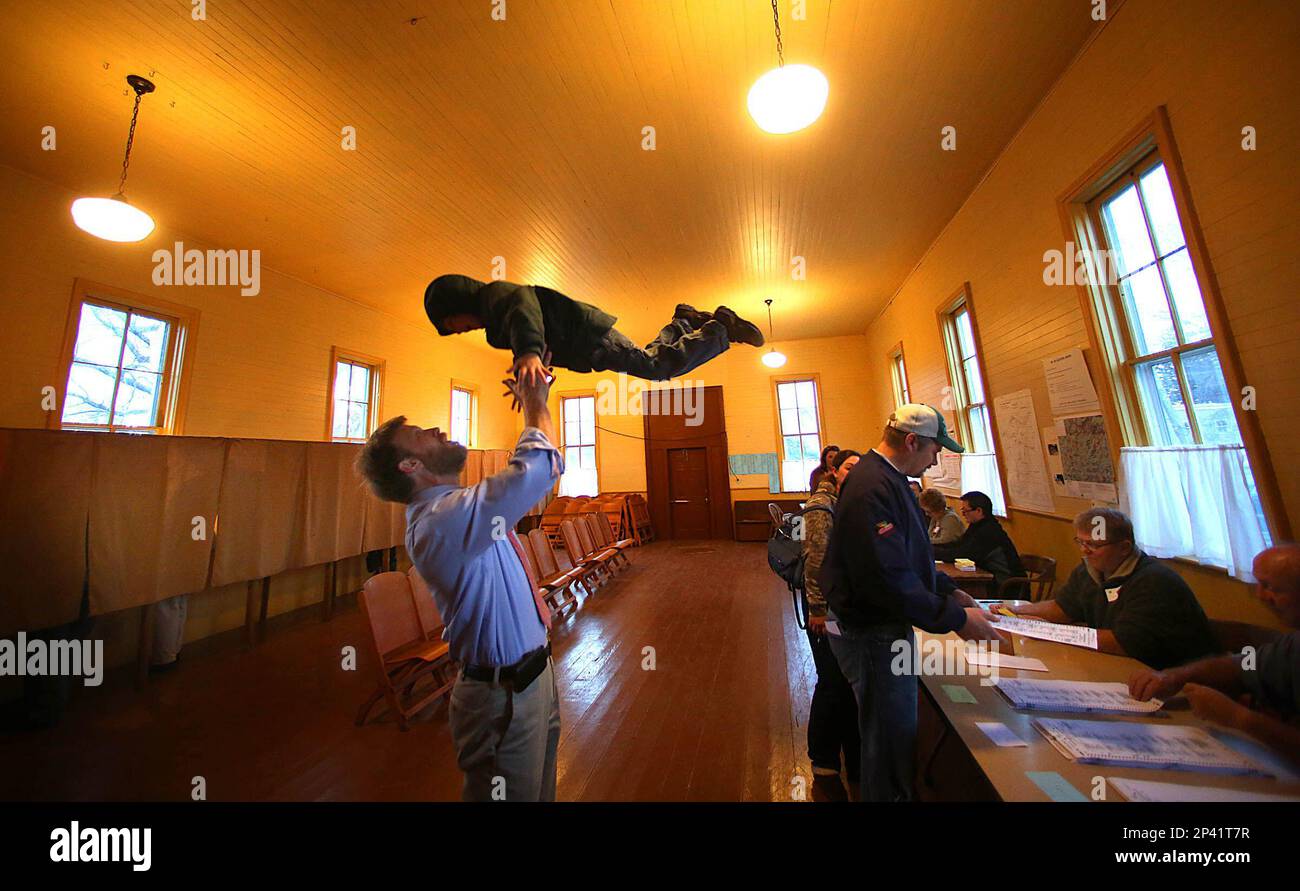 Michael Delk plays with his son, Noah, 4, while Noah's mother, Kris ...