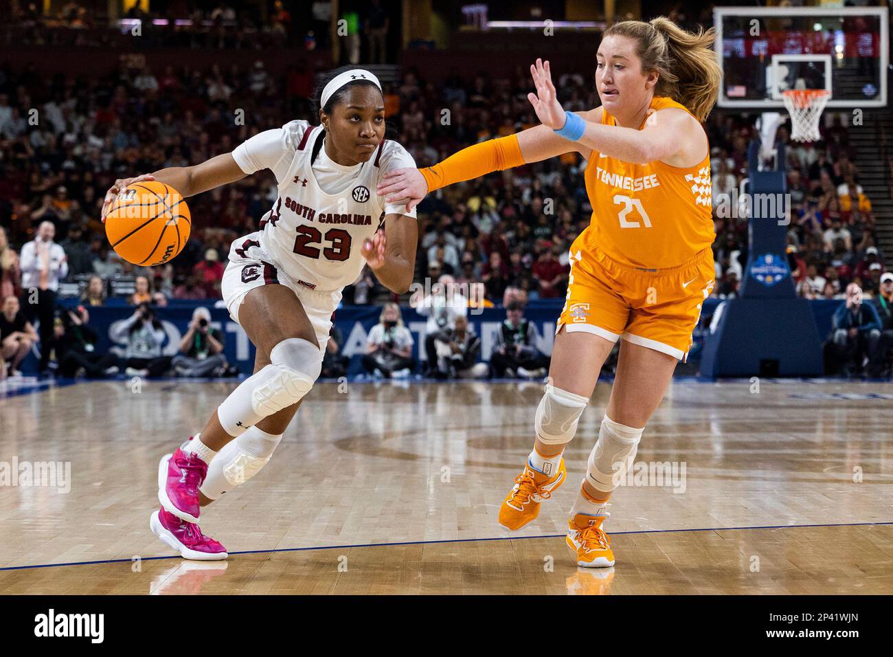 South Carolina's Bree Hall (23) drives past Tennessee's Tess Darby (21 ...