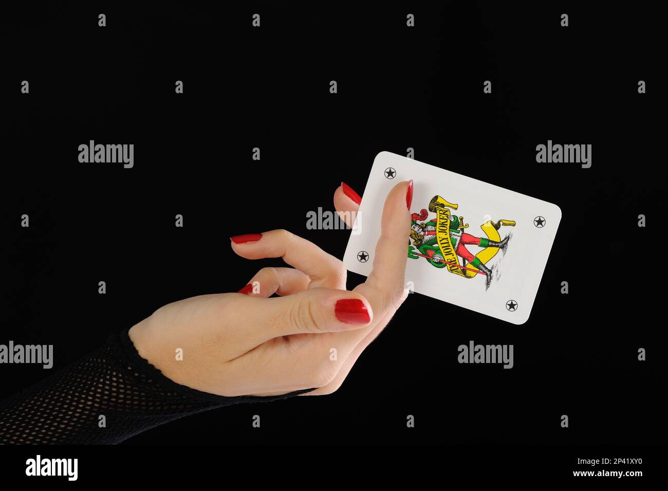 beautiful woman hand holding cards with poker chips and a card on black ...