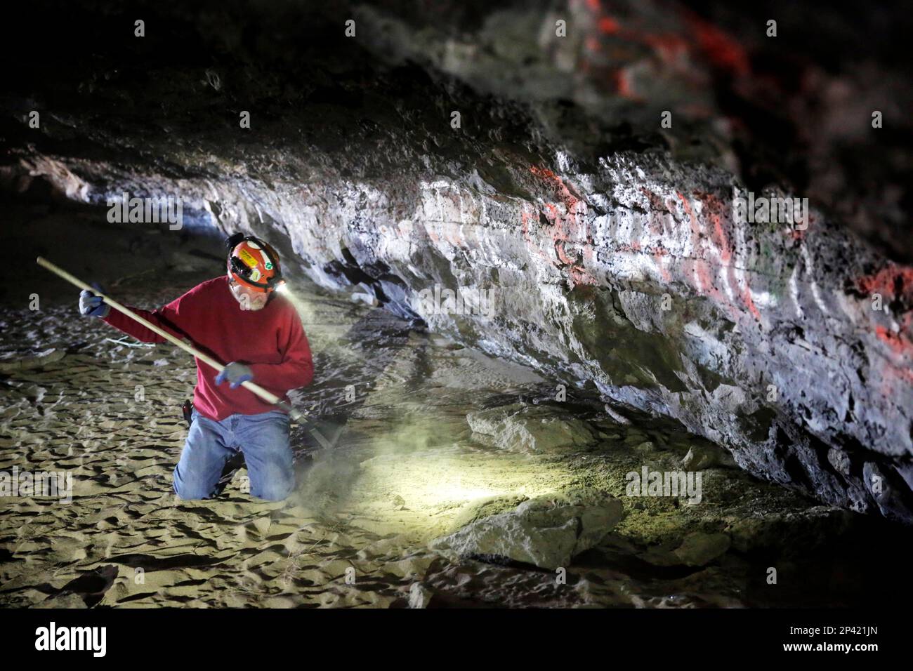 Dave Melhorn, 59, of Bend helps pick up trash inside the Redmond caves ...