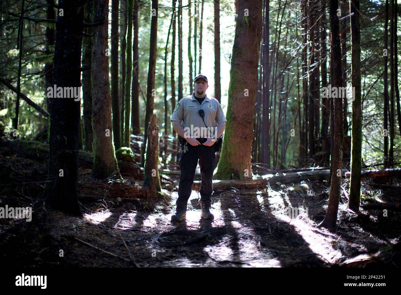 In This Oct 17 2014 Photo Dan Weidinger Stops To Check On What