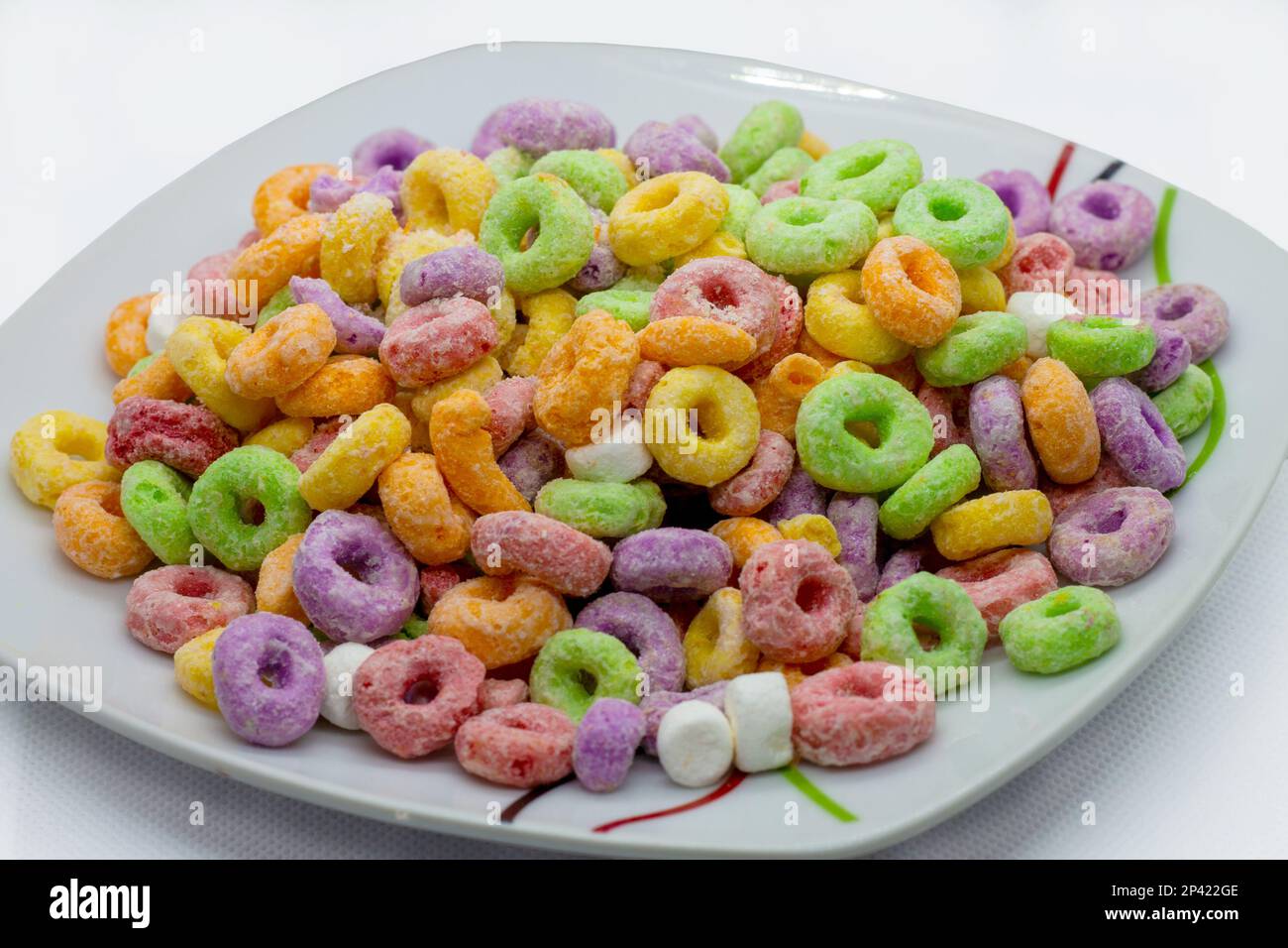 group of colored cereals in a plate, on white background Stock Photo ...