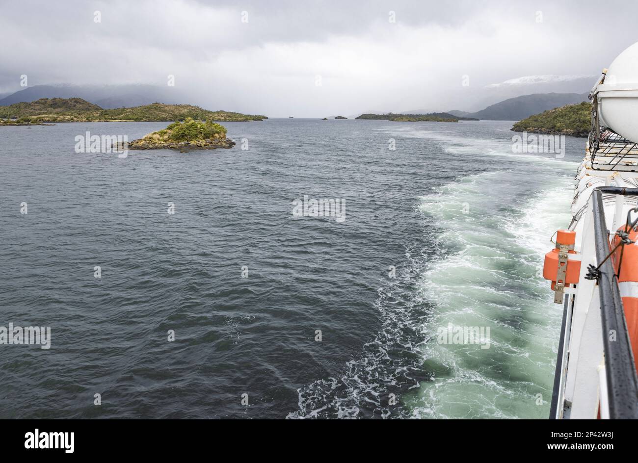 Ferry in the cold water of the fjords of southern Chile Stock Photo - Alamy