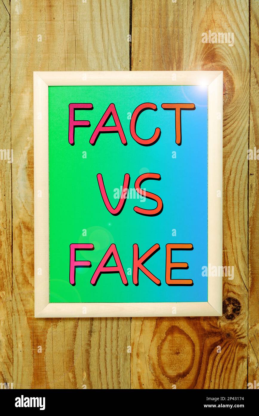 Sign displaying Fact Vs Fake. Conceptual photo Is it true or is false ...