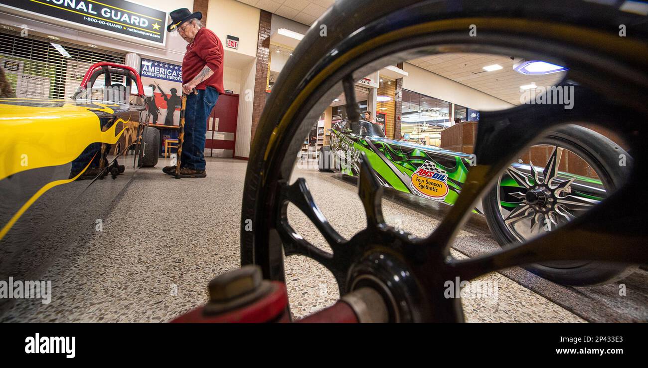 Ray Drapeau, of Otisfield, checks out one of the drag racers during the ...