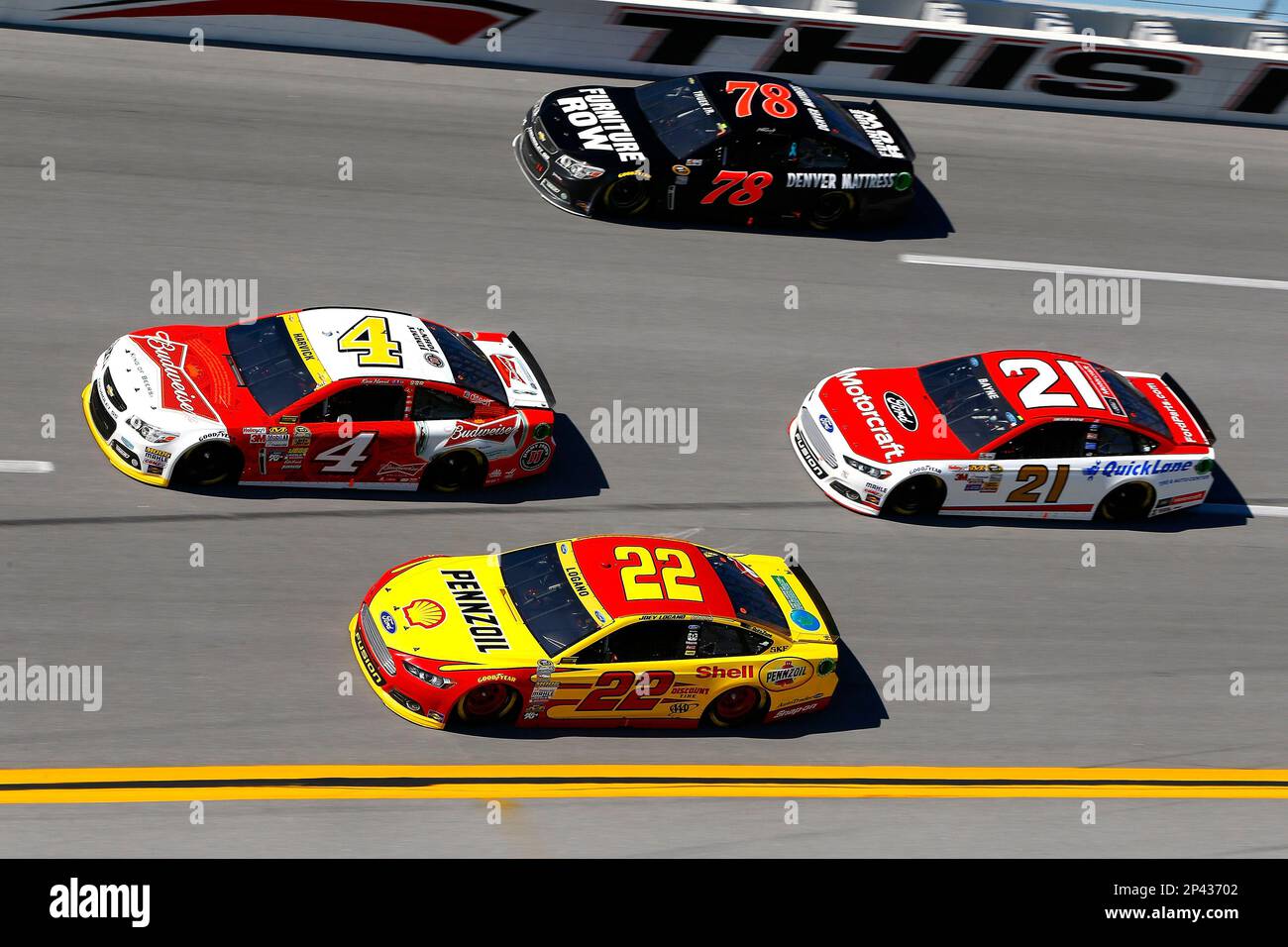 Kevin Harvick (4), Joey Logano (22), Trevor Bayne (21) and Martin Truex ...