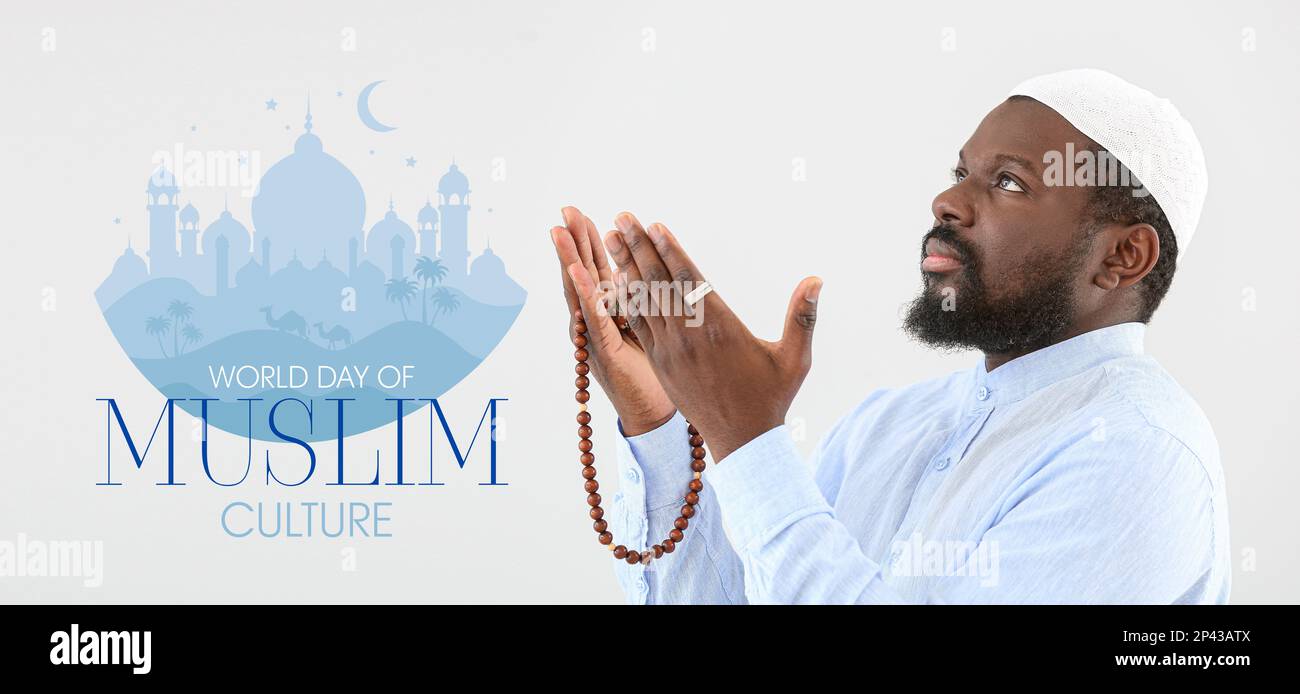 Praying African-American man on light background. World Day of Muslim ...
