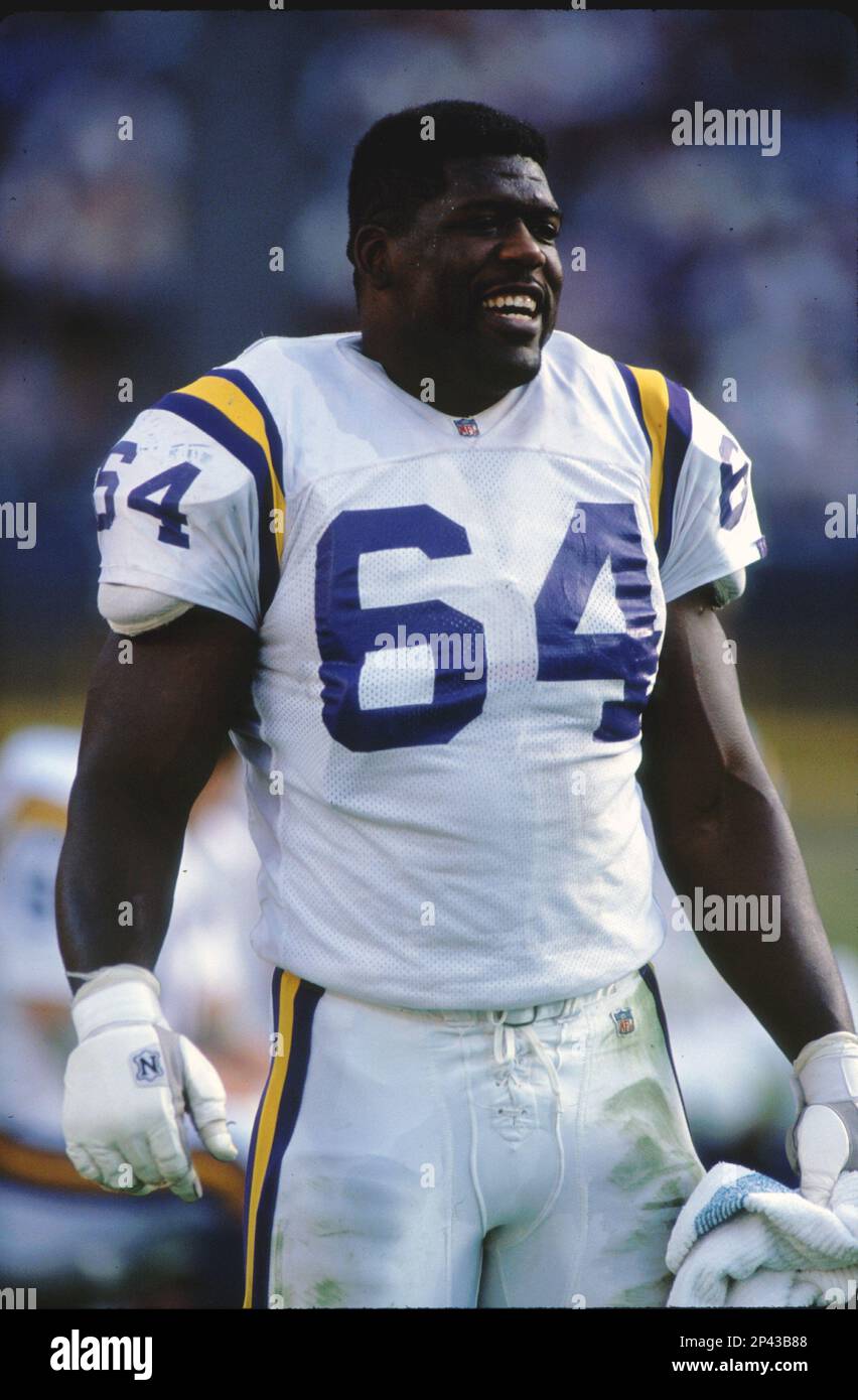 Guard Randall McDaniel #64 of the Minnesota Vikings looks on from the ...