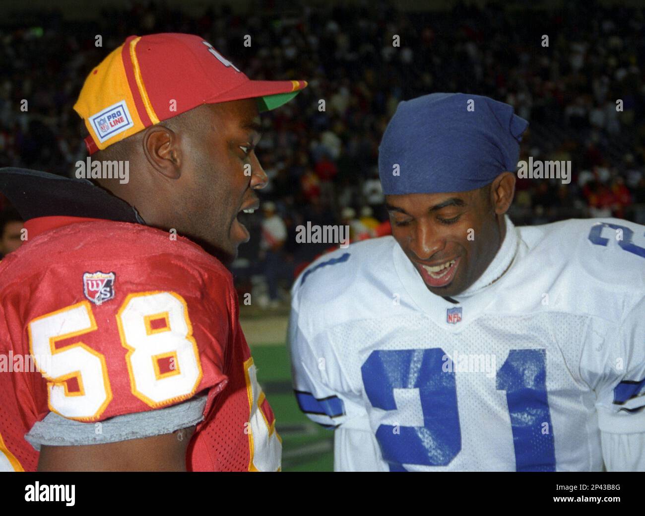 23 NOV 1995: Derrick Thomas (58) of the Kansas City Chiefs and Deion ...