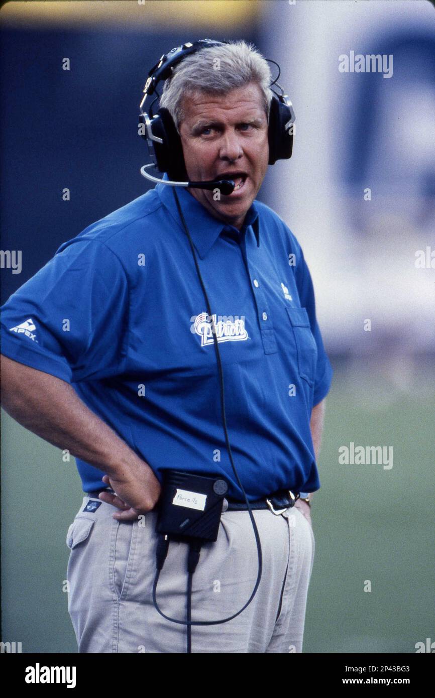 New England Patriots head coach Bill Parcells looks on from the ...