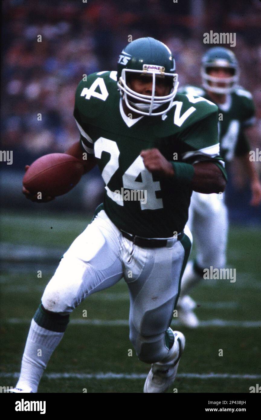 Running back Freeman McNeil #24 of the New York Jets runs the ball down ...