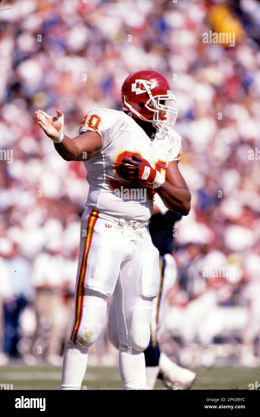 Defensive lineman Neil Smith #90 of the Kansas City Chiefs gestures ...