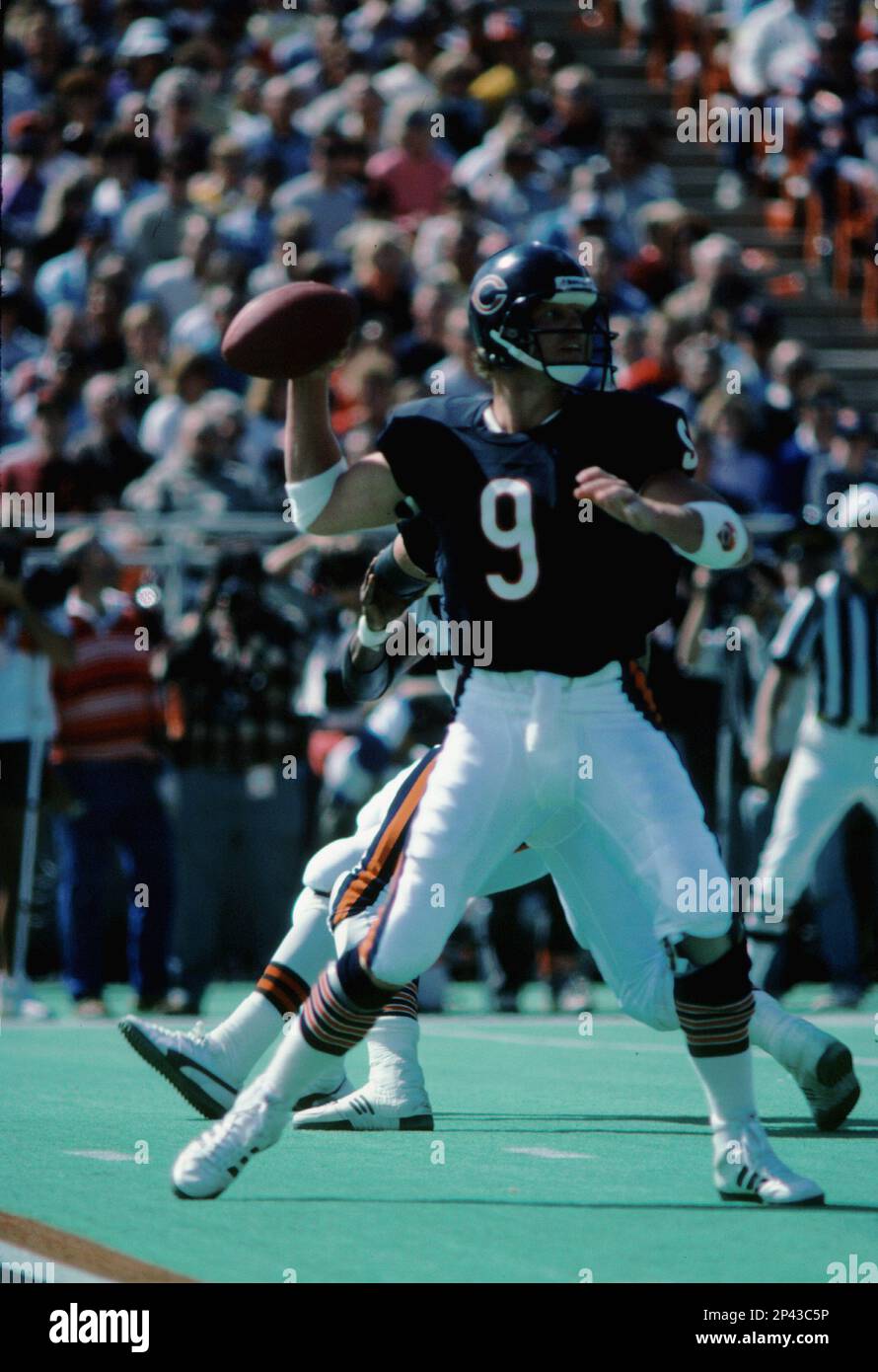 Quarterback Jim McMahon #9 of the Chicago Bears drops back to pass ...