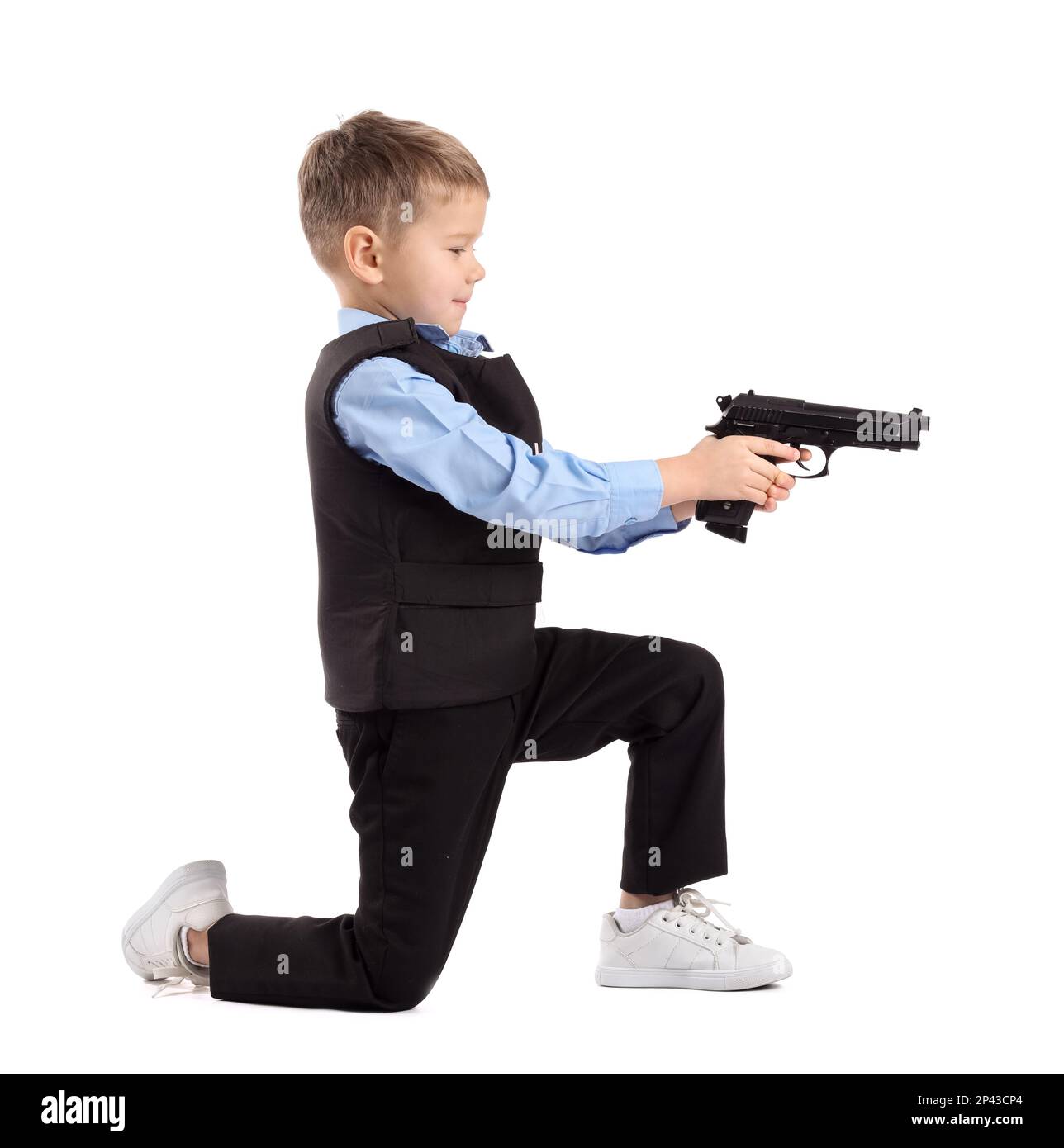 Funny little police officer with gun on white background Stock Photo ...