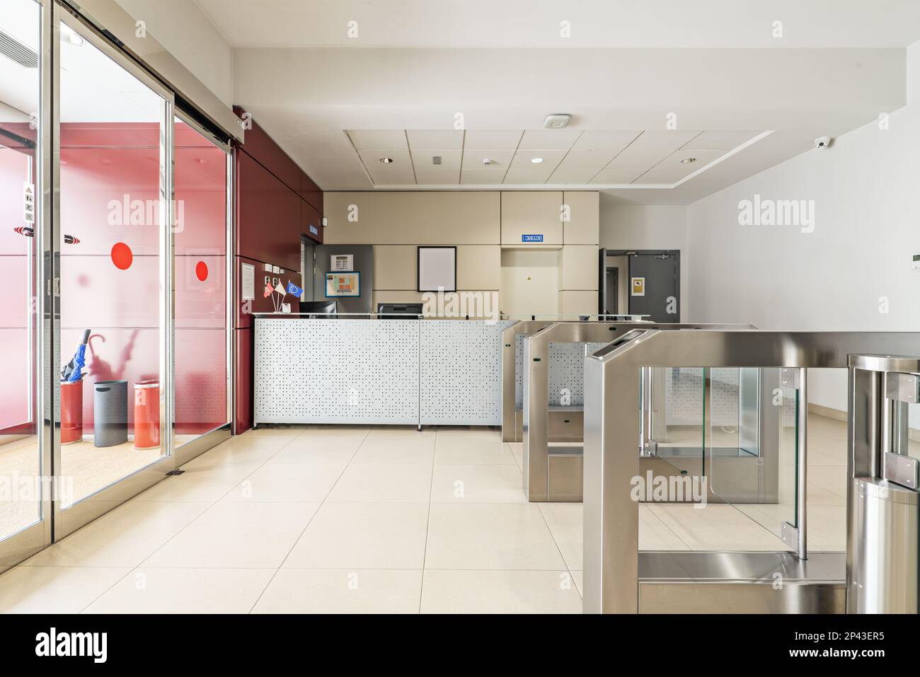 Entrance to an office building with access control with glass doors ...