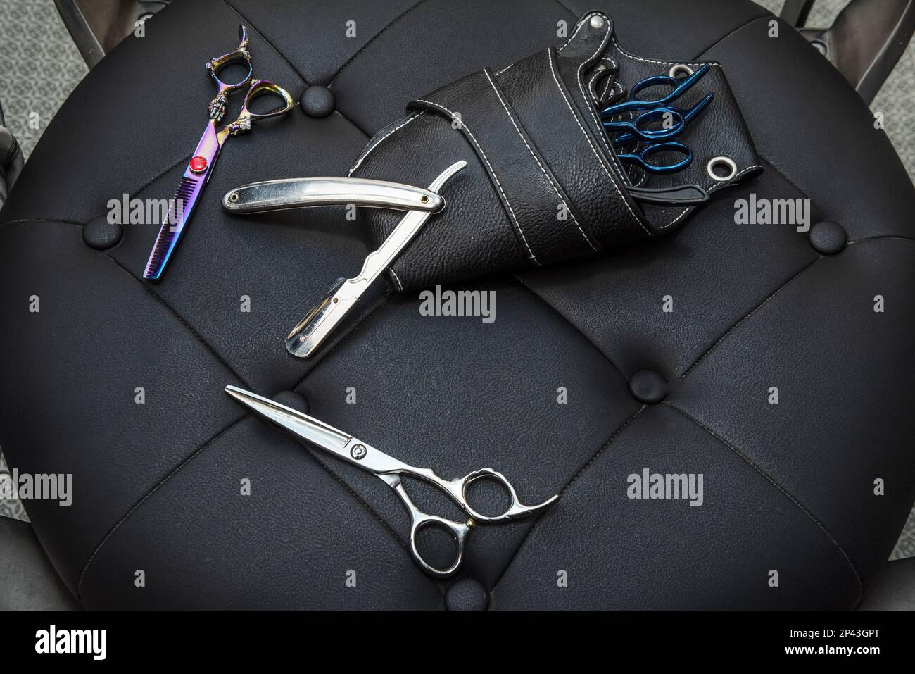 Scissors, hair removers, barber razors and a case for all of them Stock ...